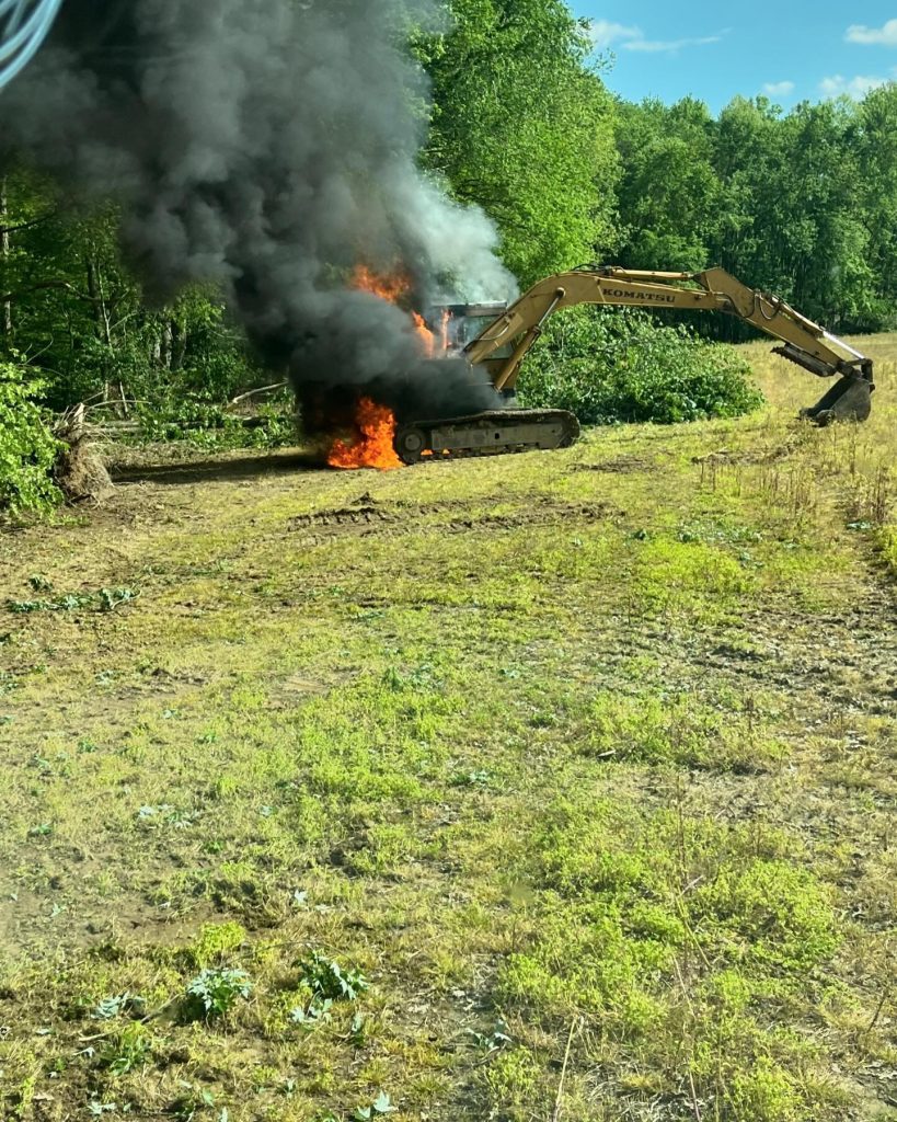 Excavator catches fire in field Saturday near Bloomington, Indiana ...